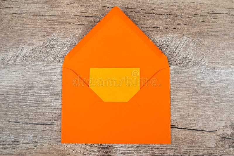 Mockup with a Card in an Orange Envelope. View from Above Stock Image ...