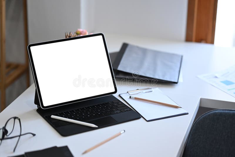 Computer Tablet with Empty Display on White Office Desk. Stock Image ...
