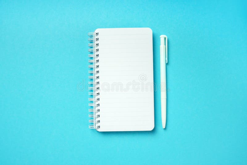 Mockup Empty Spring Notebook and Pen on a Blue Background Stock Photo ...