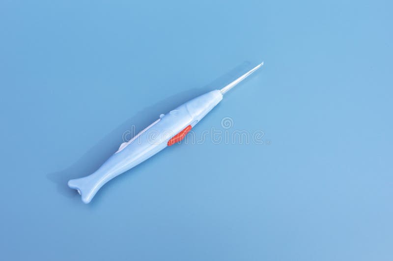 Mockup Flatly Ear Wax Removal Stick with Light or Curette on Blue ...