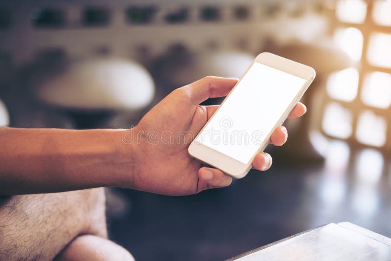 Mockup Image of Man`s Hand Holding White Mobile Phone with Blank Screen ...