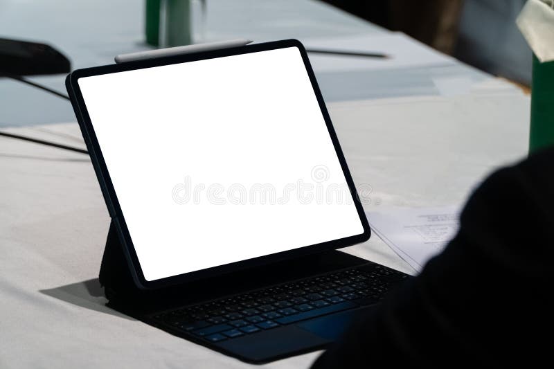 Mockup Image, Tablet with Blank White Screen on Table Meeting Room with ...