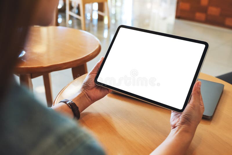 A Woman Holding Digital Tablet with Blank White Desktop Screen Stock ... A Woman Holding Digital Tablet with Blank White Desktop Screen Stock ...