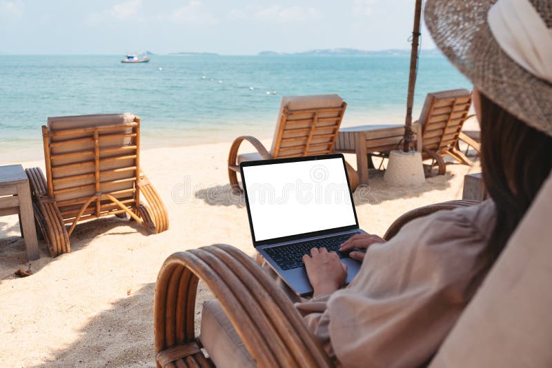 A Woman Using and Typing on Laptop Computer with Blank Desktop Screen ...