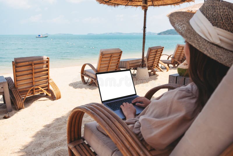 A Woman Using and Typing on Laptop Computer with Blank Desktop Screen ...