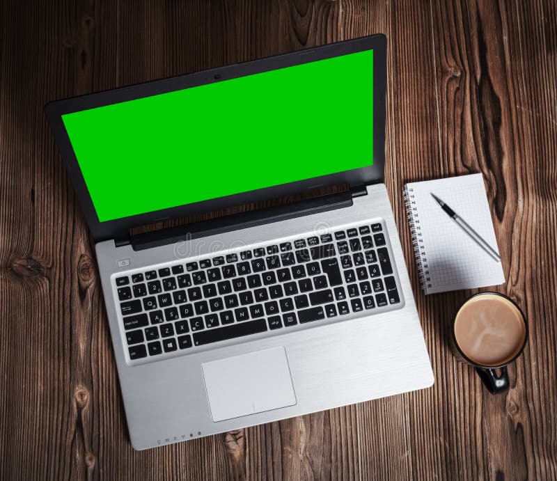 Mockup of Laptop Computer with Empty Green Screen Next To Coffee Cup ...