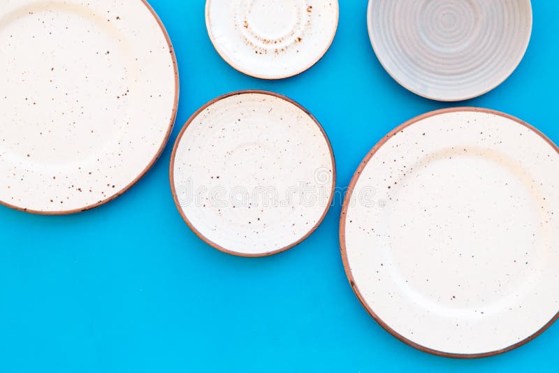 Mockup with Plates. Empty Ceramic Plates on Blue Background Top View ...