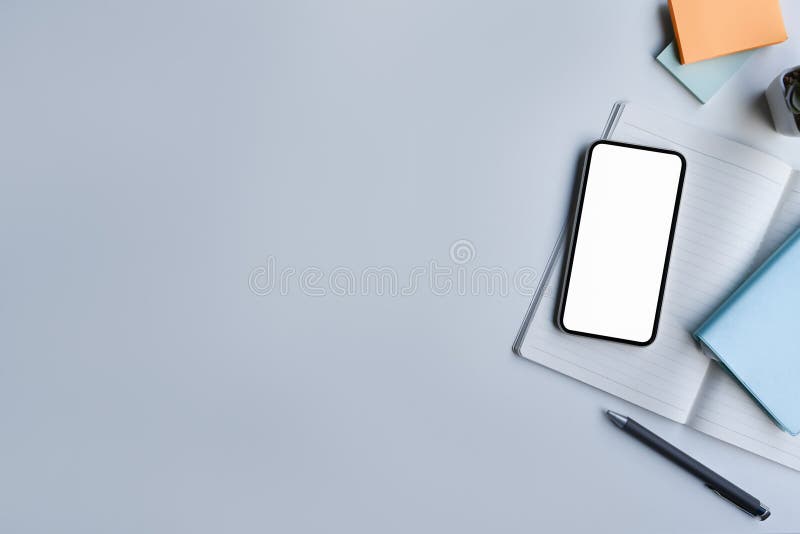 Smart Phone with Blank Screen, Notebook and Sticky Notes on White Table ...