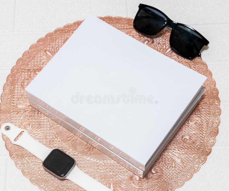 Mockup of a White Blank Book Cover Placed on the Top of a Mat Stock ...