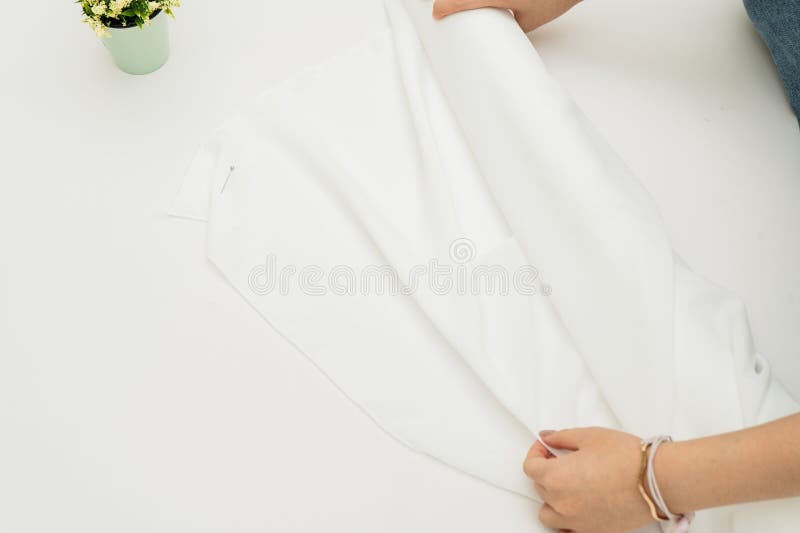 In a Serene and Stylish Minimalistic Environment, the White Fabric Roll ...