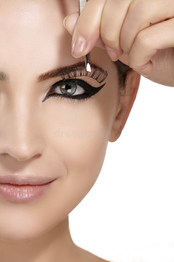 Model Applying Artificial Eyelashes Extension on Smoky Eye Stock Image ...