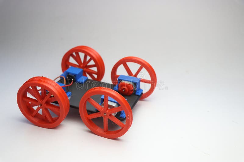 Model of an Assembled Wheel Movement for a Robotic Car on a White ...