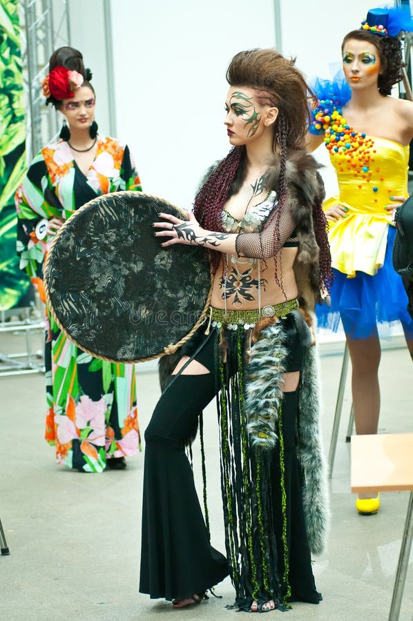 Model Barbarian-style Prepares Backstage during Editorial Photo - Image ...