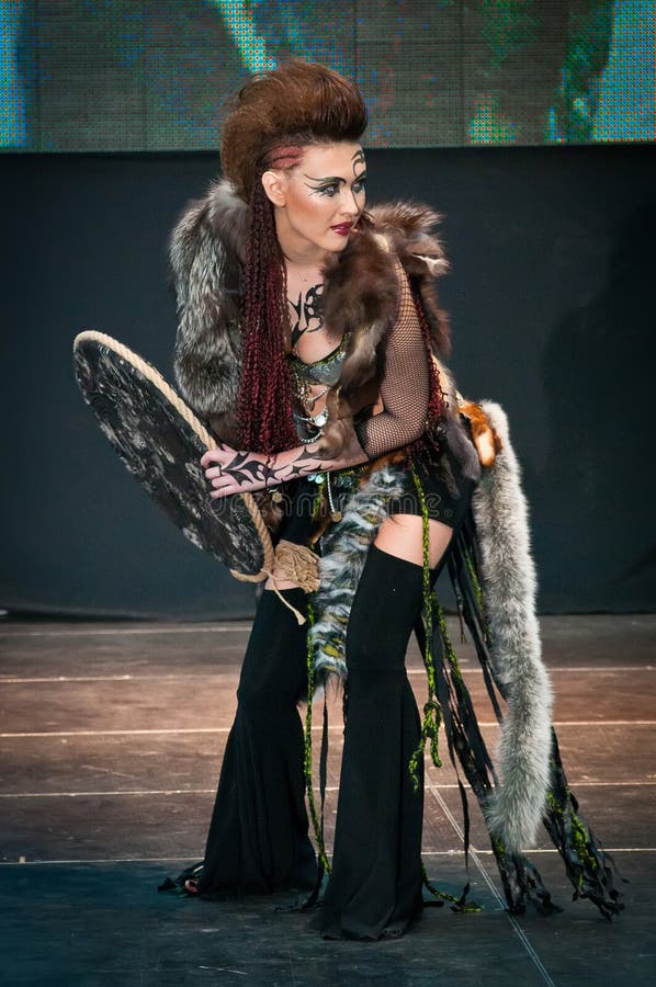 Model in Barbarian-style Walks the Runway during Editorial Photo ...