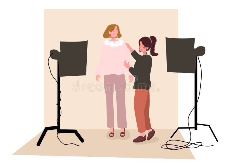 Model is Being Dressed by Stylist during Photo Session Break in Studio ...