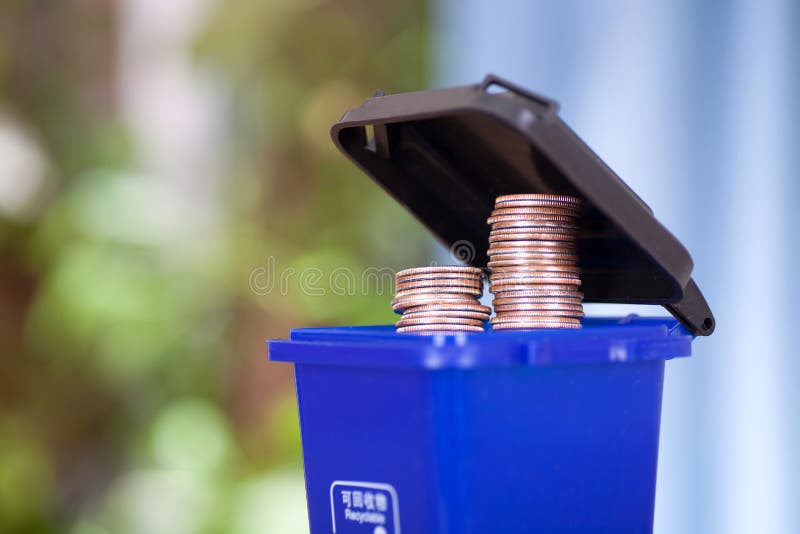 A Model of a Blue Trash Can Containing Recyclable Trash in the Trash ...