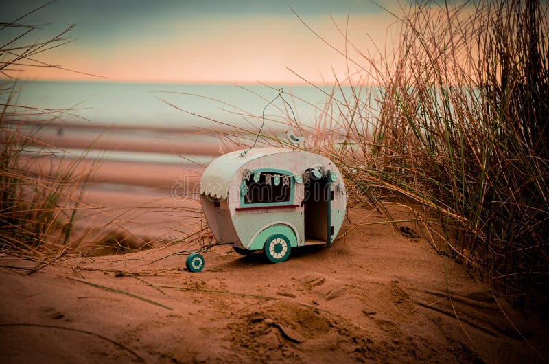 Model Caravan Display on the Sandy Beach Stock Photo - Image of sand ...
