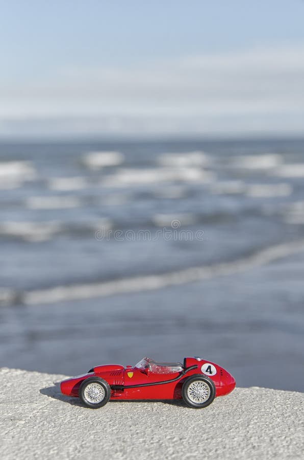 Model of a Classic Red Car Over the Sea Editorial Photography - Image ...