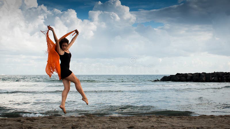 Model dancing on the beach stock image. Image of happiness - 77442869