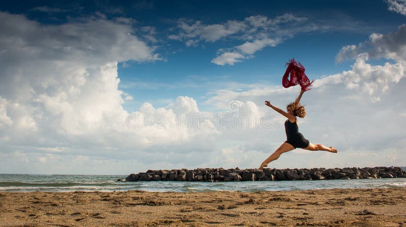 Model dancing on the beach stock photo. Image of dance - 77442902