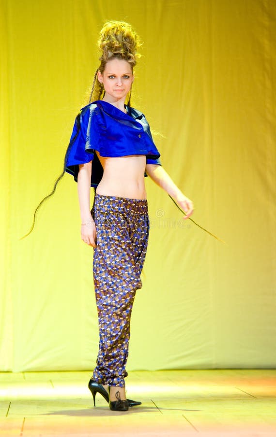 Model demonstrates hairdo editorial photo. Image of jacket - 24365371