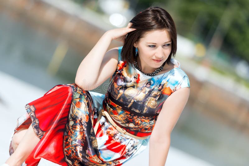Model in Dress Posing on Exterior Set Angled Stock Photo - Image of ...