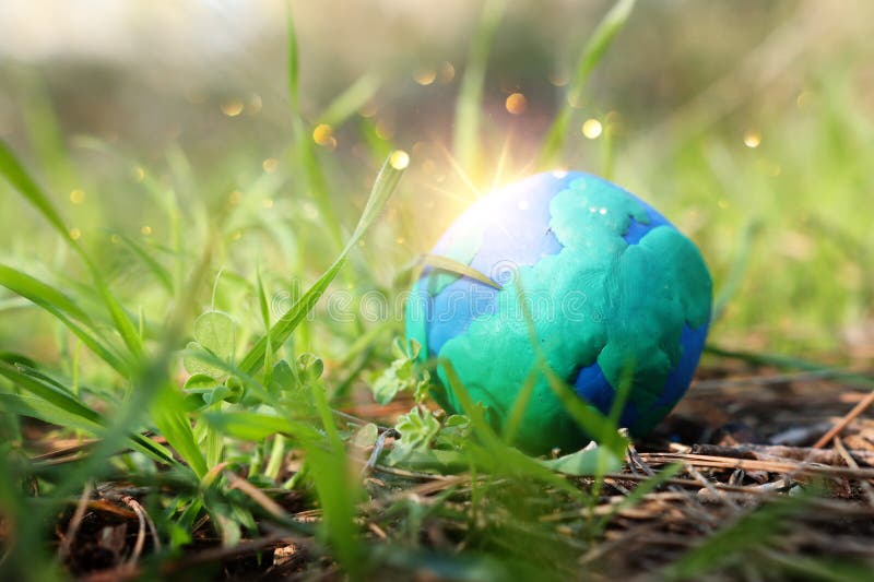 Model of Earth on the Ground in the Forest with Bright Sun Light ...