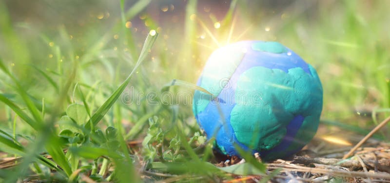 Model of Earth on the Ground in the Forest with Bright Sun Light ...