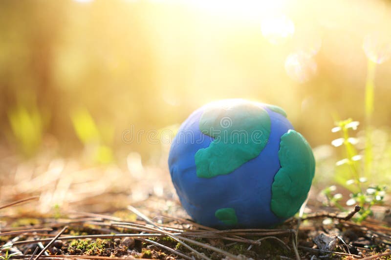 Model of Earth on the Ground in the Forest with Bright Sun Light ...