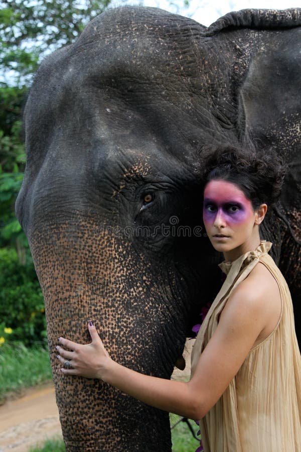Model and elephant. stock image. Image of girl, model - 15755817