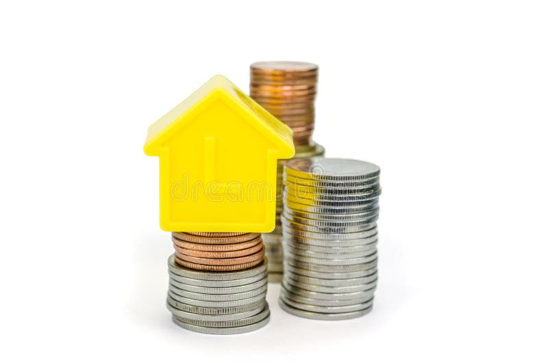 A model home and coins stock image. Image of investment - 41627769
