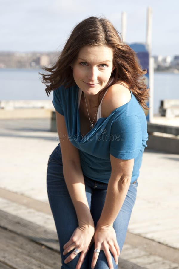Model posing on waterfront stock image. Image of smile - 30392547