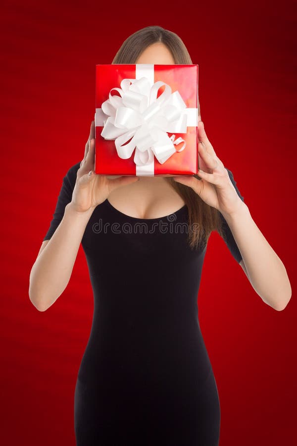 Model with Present in Front of Her Face Stock Image - Image of ribbon ...