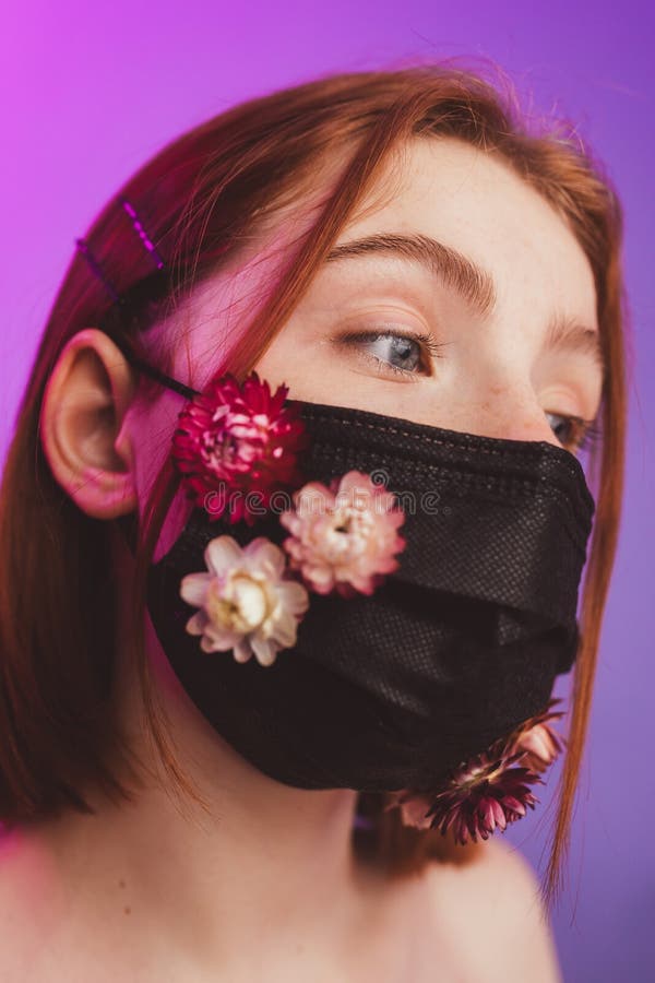 Model in Protective Face Mask Posing on Violet Background Stock Image ...