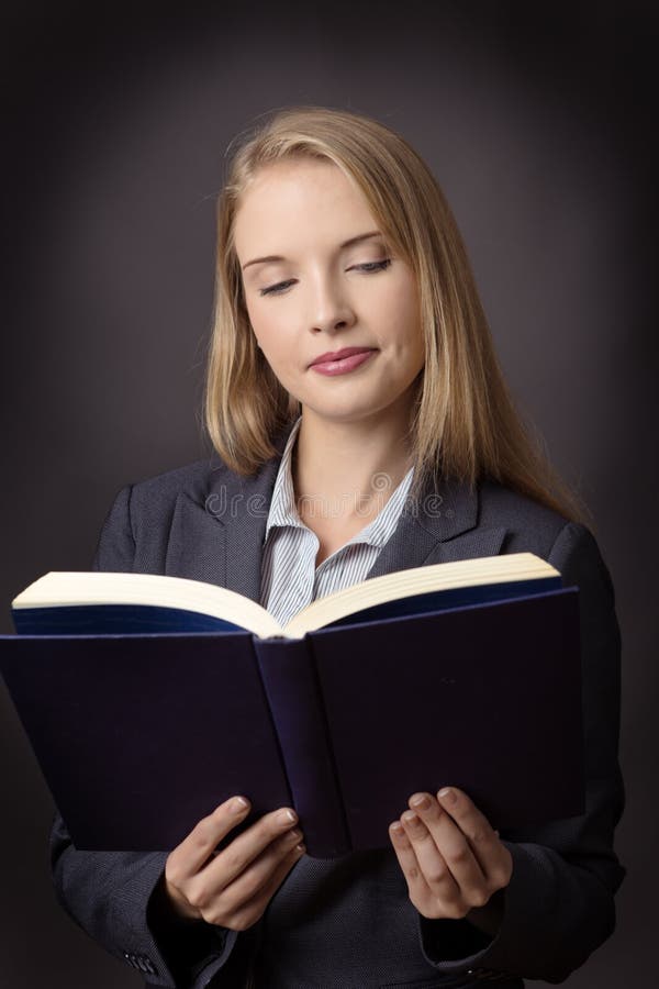 Model reading a book stock image. Image of emotion, open - 67672053