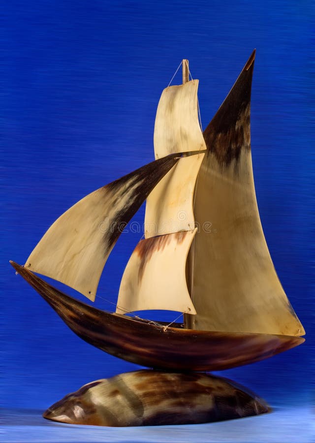 A Model of a Ship Made of Animal Horns on a Blue Background. Stock ...
