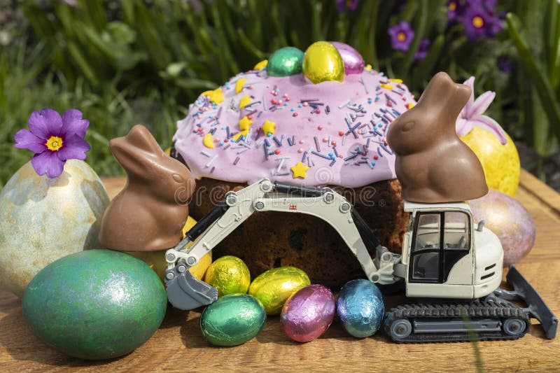 Model of a Toy Excavator, Easter Cake, Chocolate Bunnies with Bright ...
