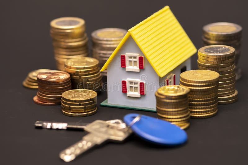 Model of a Toy House Surrounded by Coins and Apartment Keys Stock Image ...
