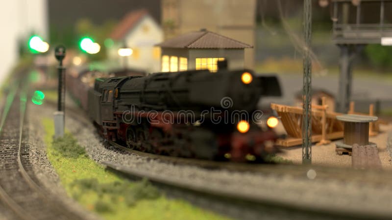 Model of Train Moving Along Railway Station. Stock Footage - Video of ...