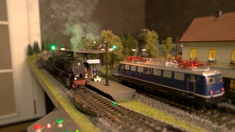Model Train with Wagons is Driving on Model Railroad. Stock Photo ...