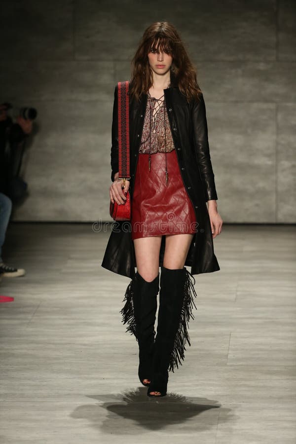 A Model Walks The Runway At The Rebecca Minkoff Fashion Show With