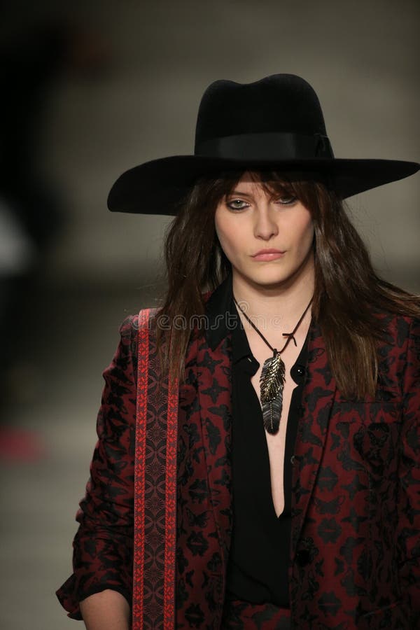 A Model Walks The Runway At The Rebecca Minkoff Fashion Show With