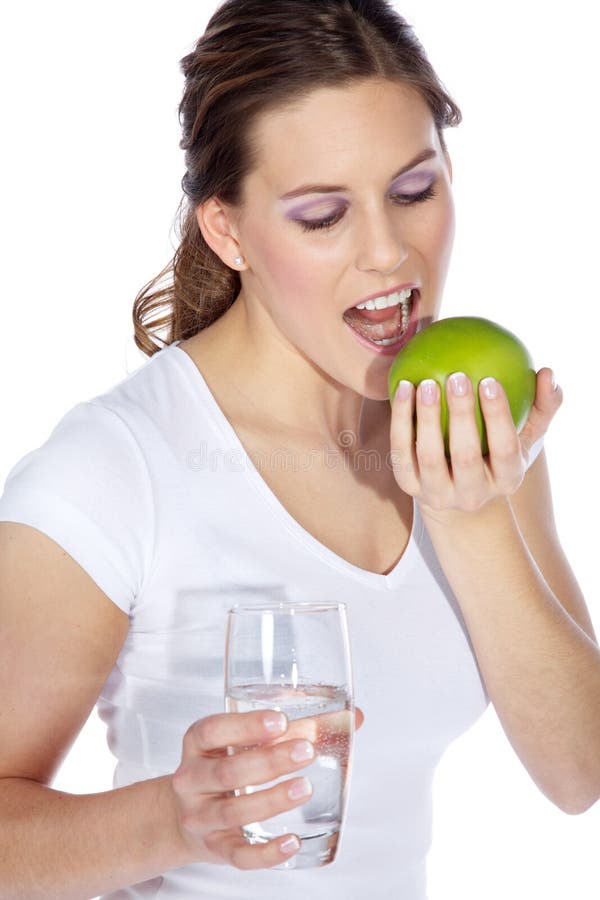 Model with water and apple stock image. Image of sportswear - 40075967