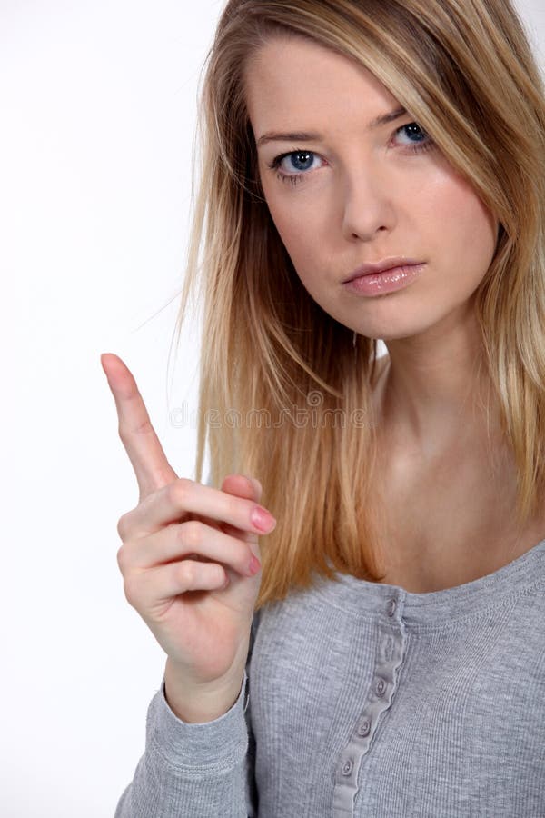 Model waving her finger stock image. Image of femininity - 26646279