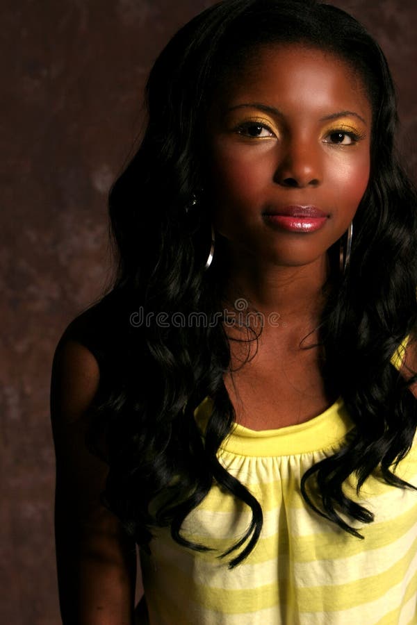 Model in Yellow portrait stock photo. Image of brown, skin - 1442064