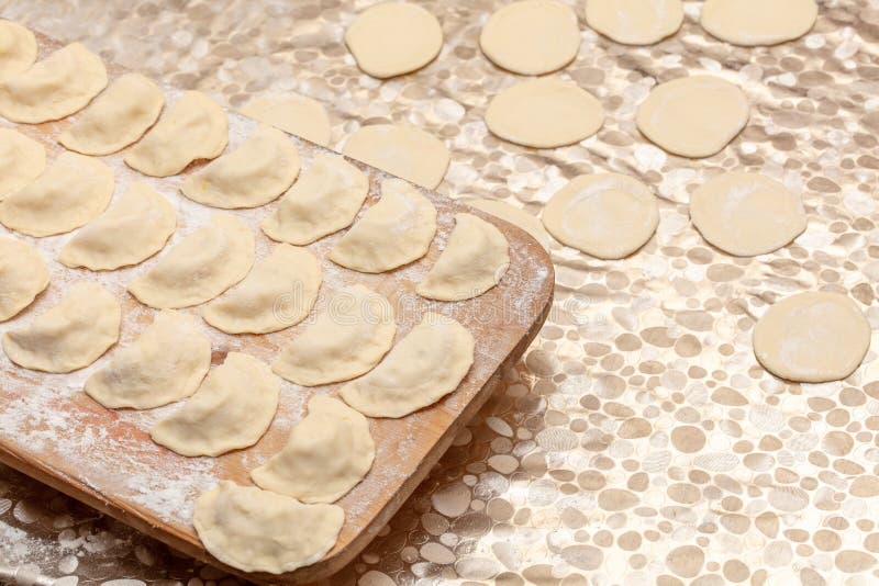 Modeling Dumplings from Dough on the Table Stock Photo - Image of ...