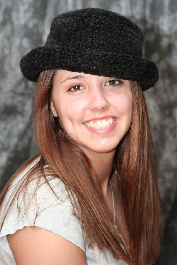 Modeling a hat stock image. Image of modeling, brown, young - 5031313