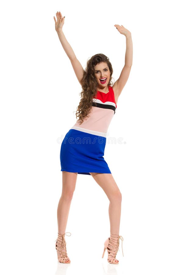 Modelo De Moda Emocionado in Mini Dress and High Heels Foto de archivo ...