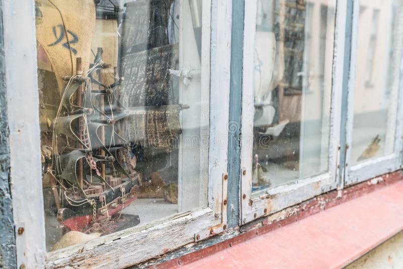 Models of Ancient Ships and Boats Behind Old Window Stock Photo - Image ...