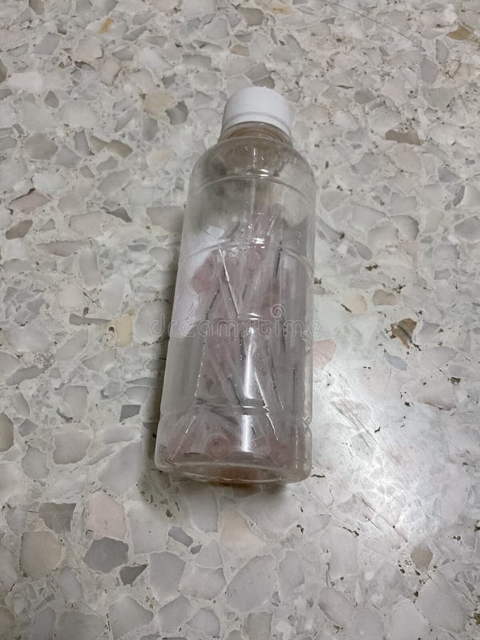 Models for Managing Infectious Waste,closeup View of a Bottle of Water ...